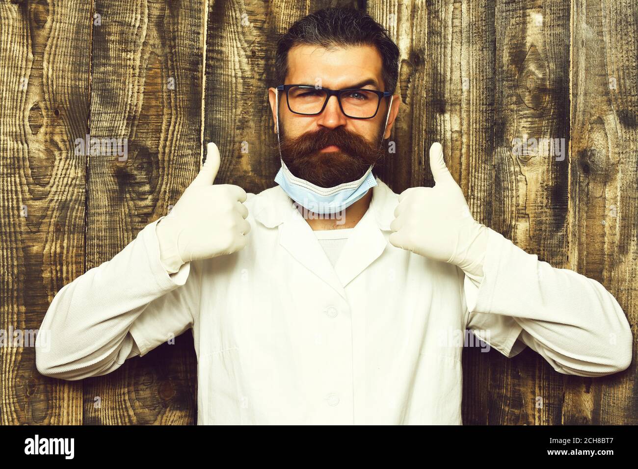 Bearded man, long beard. Brutal caucasian doctor or unshaven hipster ...