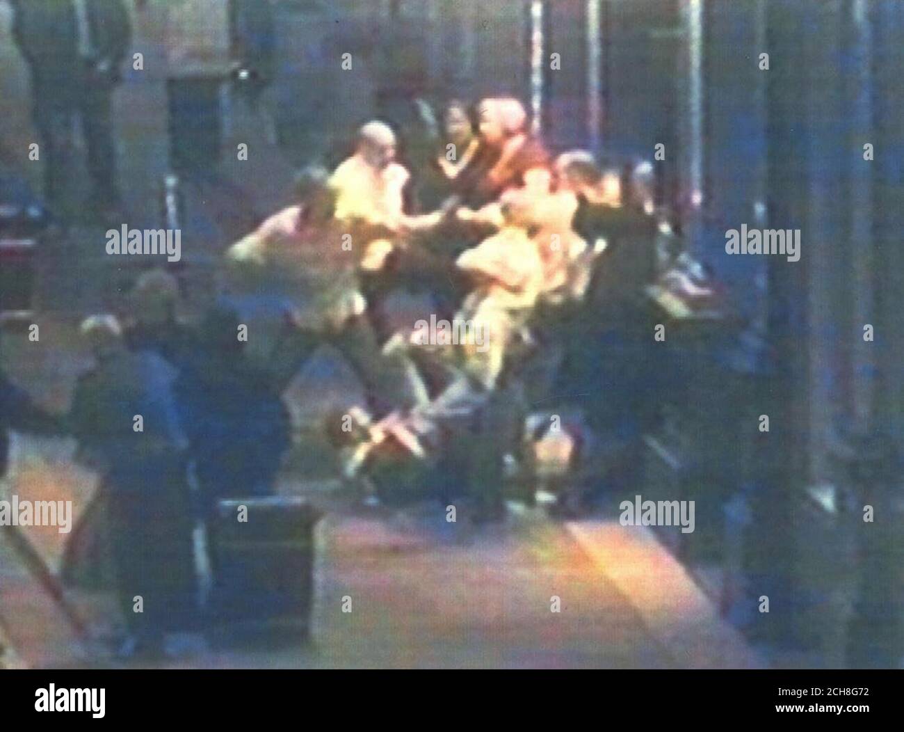 Gang of men attacking door staff at yates wine lodge hi-res stock ...