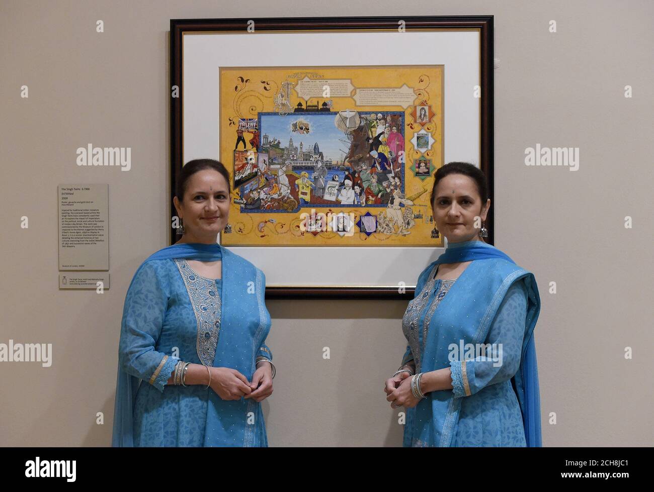 The Singh Twins stand with their artwork 'EnTWINed', which forms part ...
