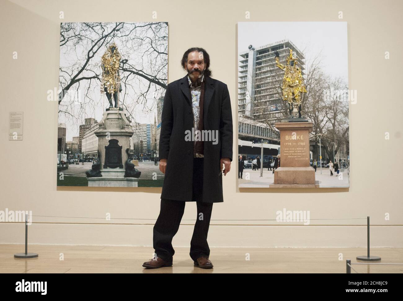 Artist Hew Locke stands with his work 'Edward Colston' (left) and ...