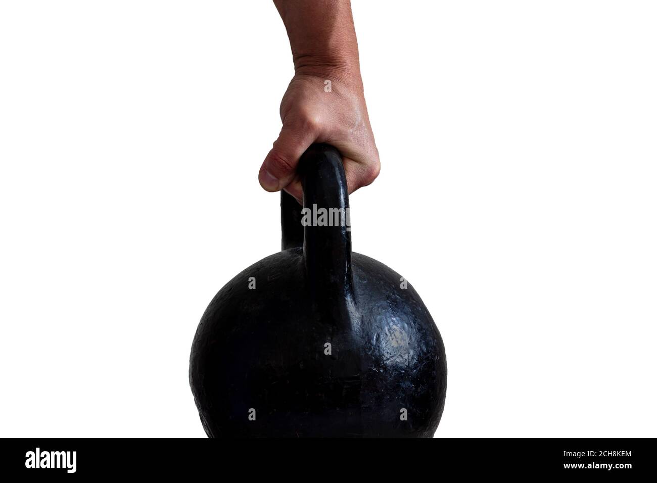 Muscular man training hard kettlebell hi-res stock photography and ...