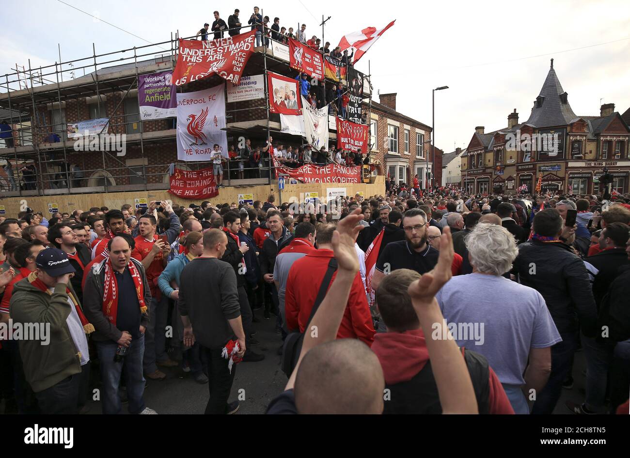 Fans on scaffolding outside the ground Stock Photo - Alamy