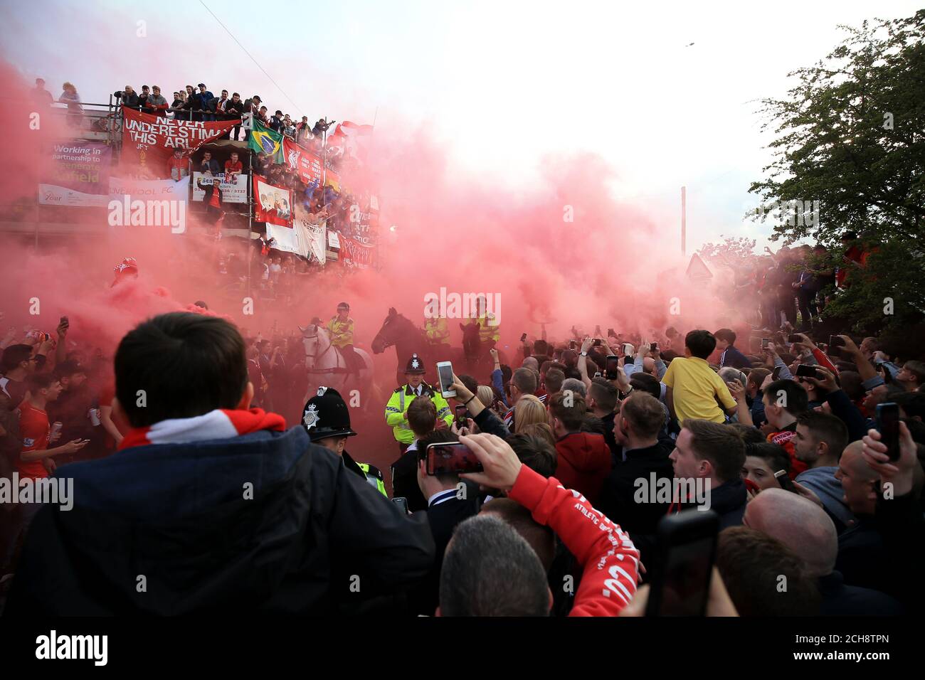 Fans on scaffolding outside the ground Stock Photo - Alamy