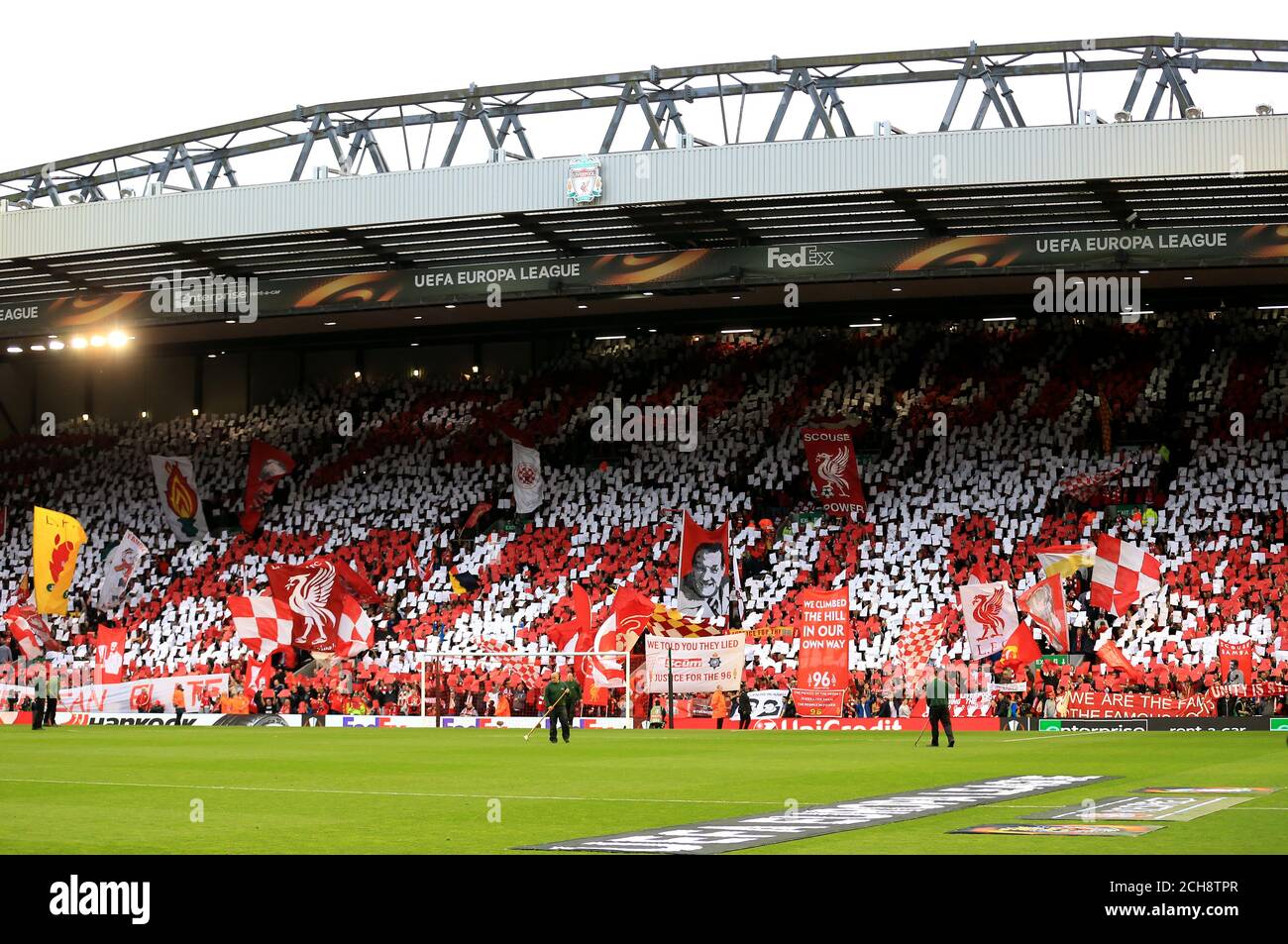 Liverpool fans in the stands Stock Photo - Alamy