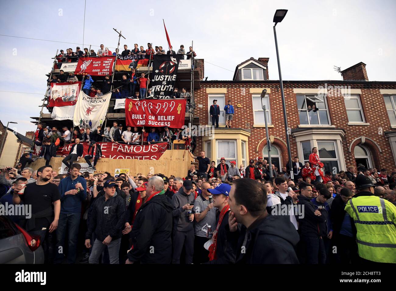 Fans on scaffolding outside the ground Stock Photo - Alamy