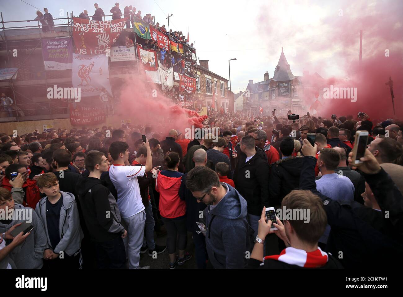 Fans on scaffolding outside the ground Stock Photo - Alamy