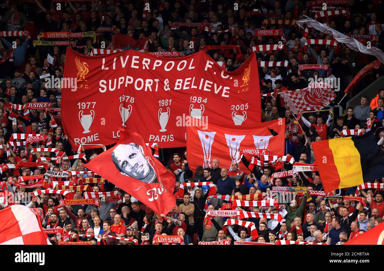 Liverpool fans in the stands Stock Photo - Alamy