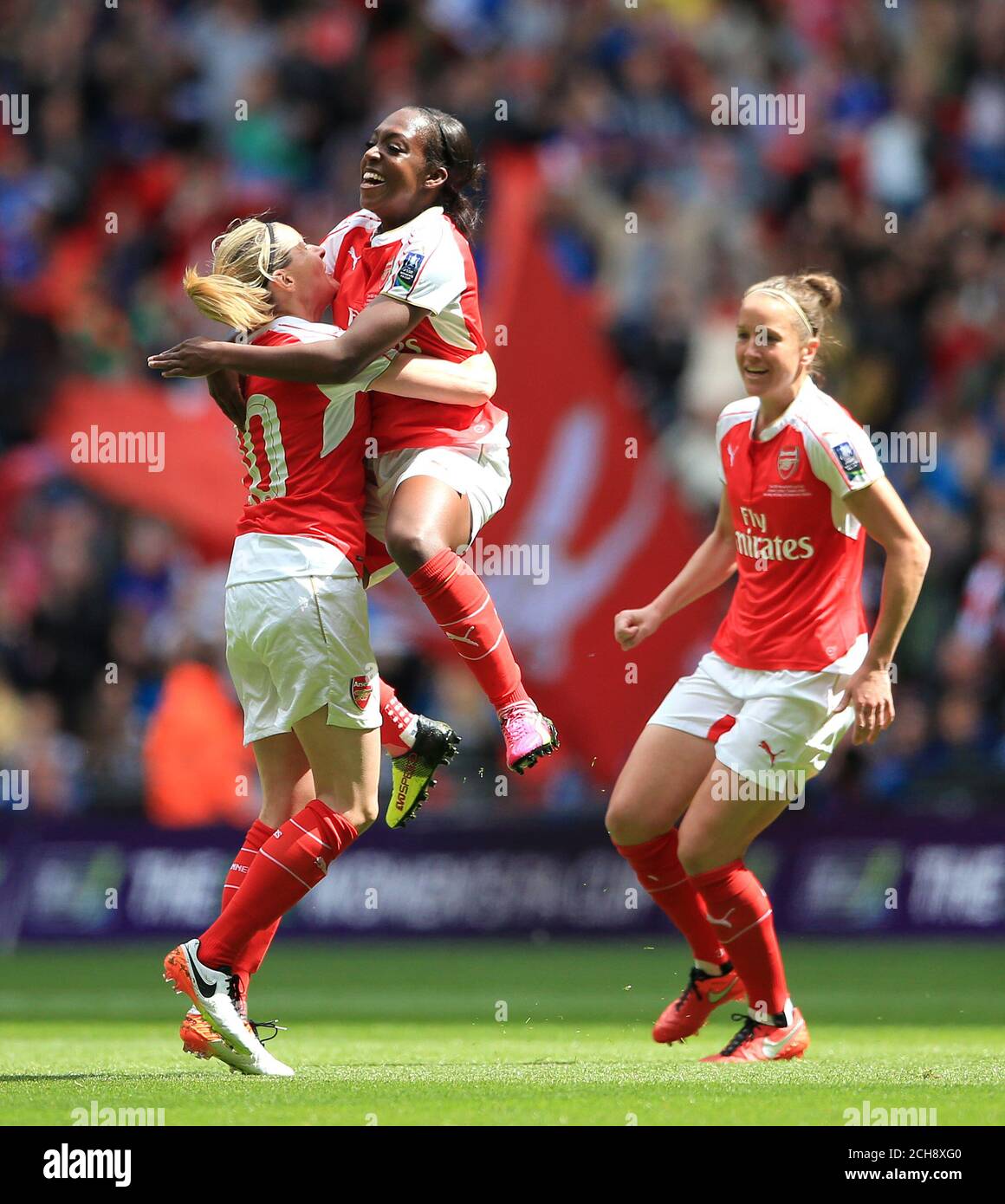 Arsenal's Danielle Carter (centre) celebrates scoring her side's first ...