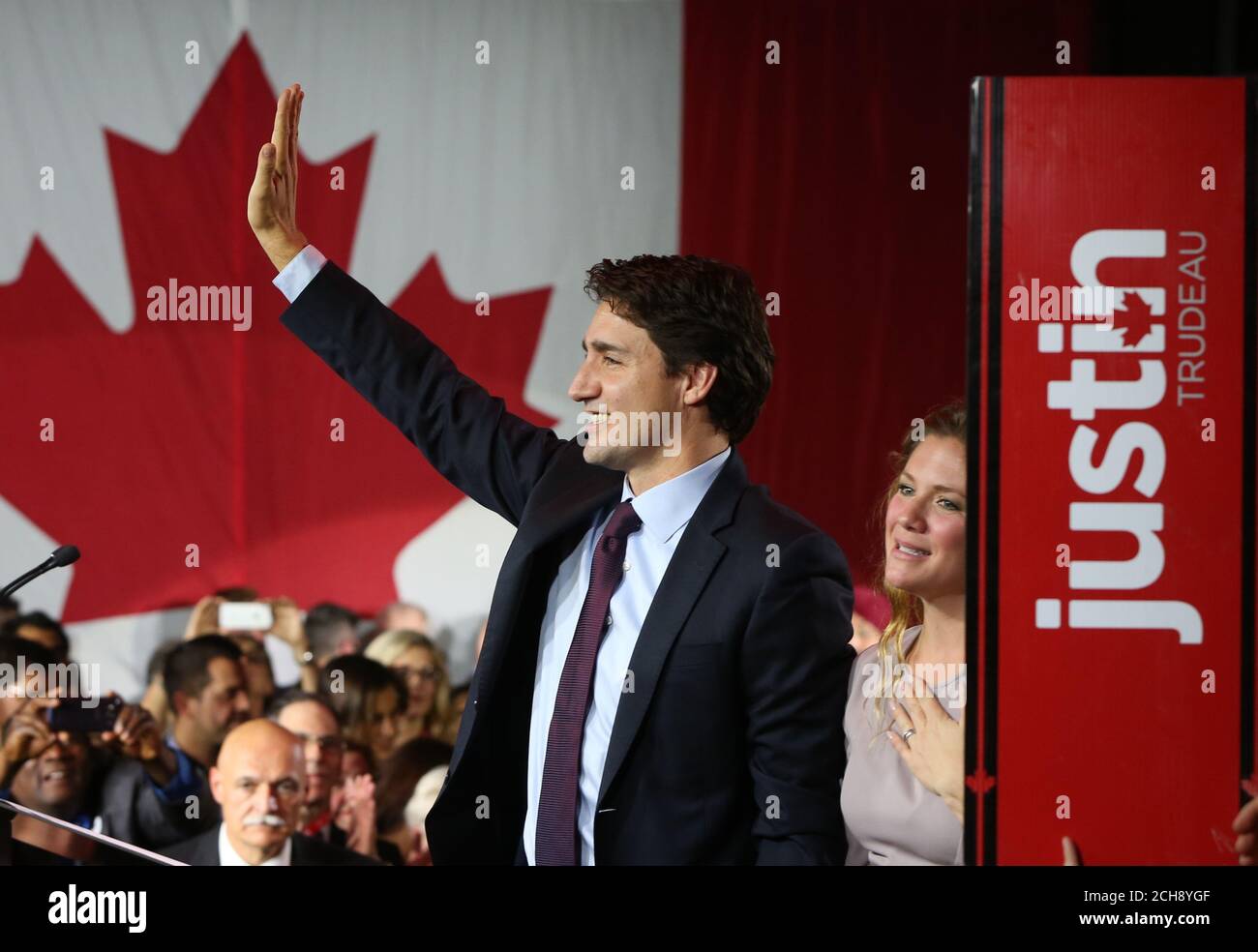 Canadian man wave flag hi-res stock photography and images - Alamy