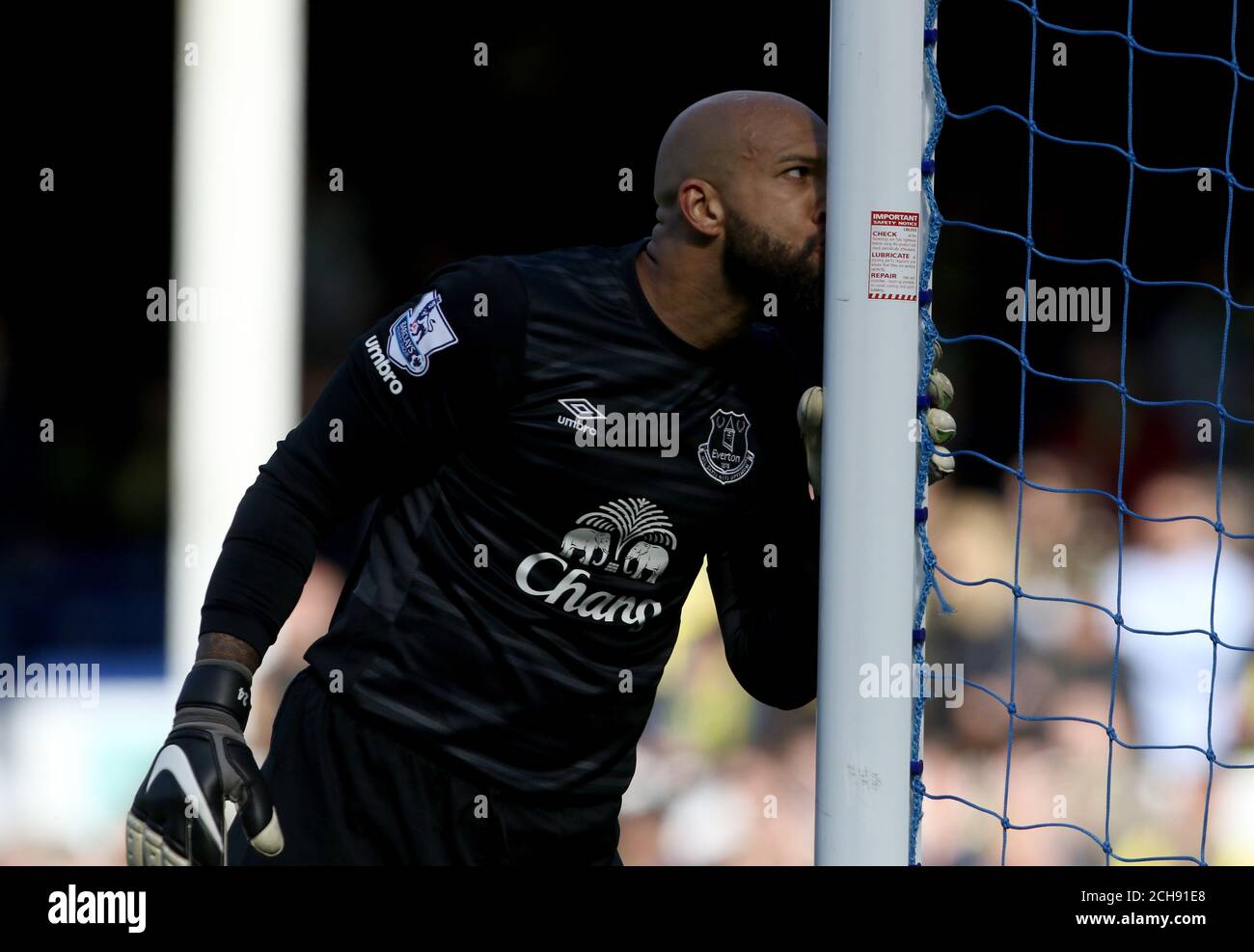 Everton goalkeeper Tim Howard kisses the goal post after the Barclays ...