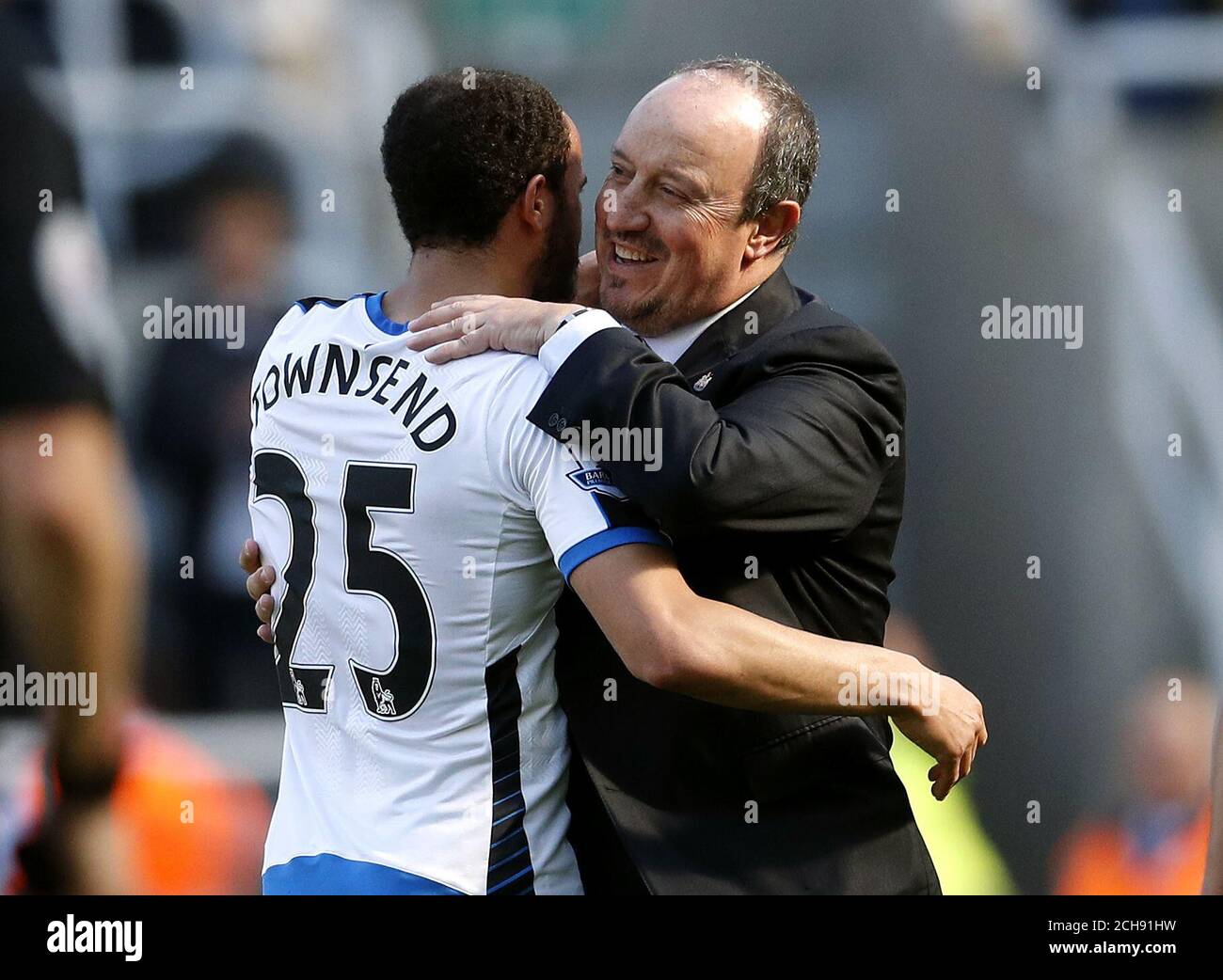 Newcastle United manager Rafael Benitez embraces Andros Townsend after ...