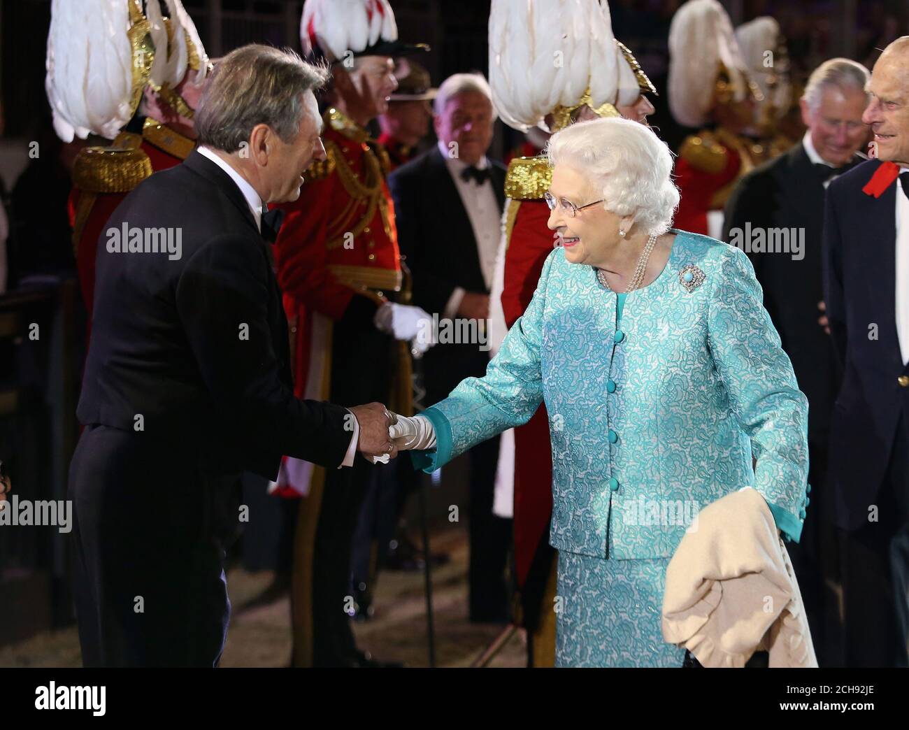 Queen Elizabeth II greets Alan Titchmarsh during the televised ...