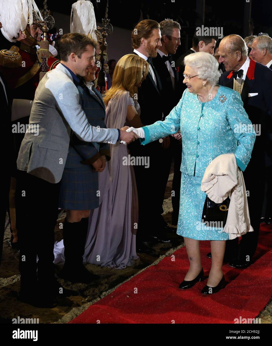 Queen Elizabeth II greets James Blunt during the televised celebration ...