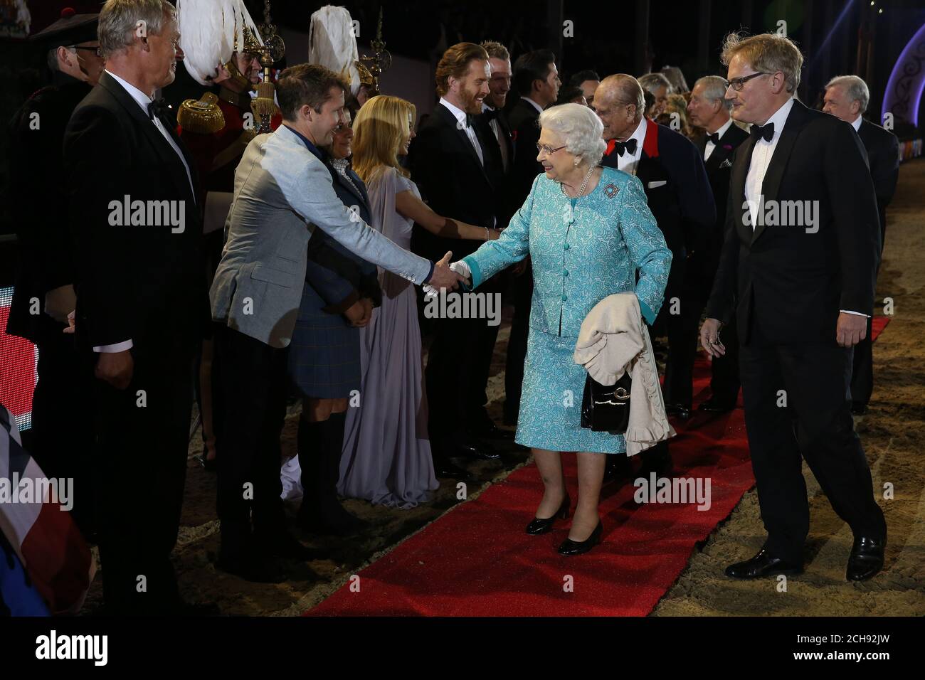 Queen Elizabeth II greets James Blunt during the televised celebration ...