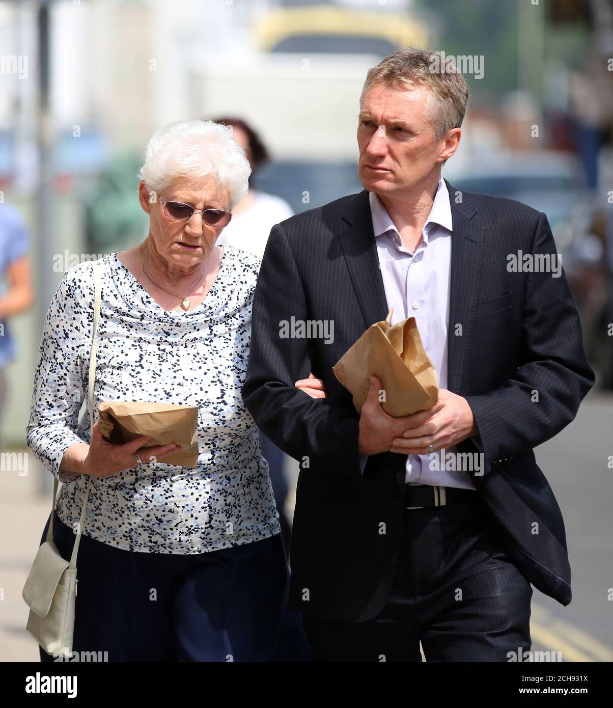 Maureen Lock (left), the widow of Donald Lock and their son Andrew Lock ...