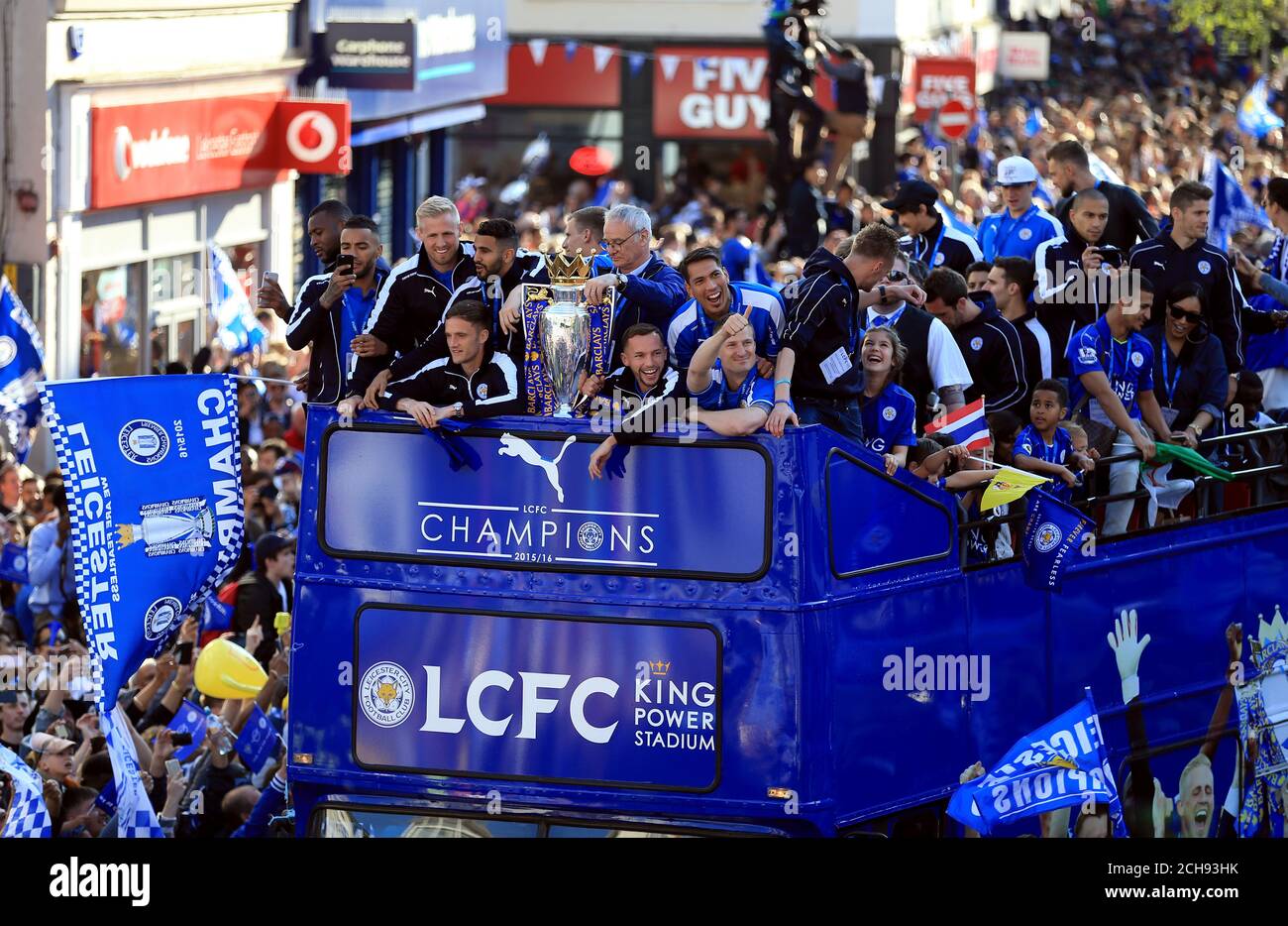 Leicester City's team on the bus as fans look on during the open top ...