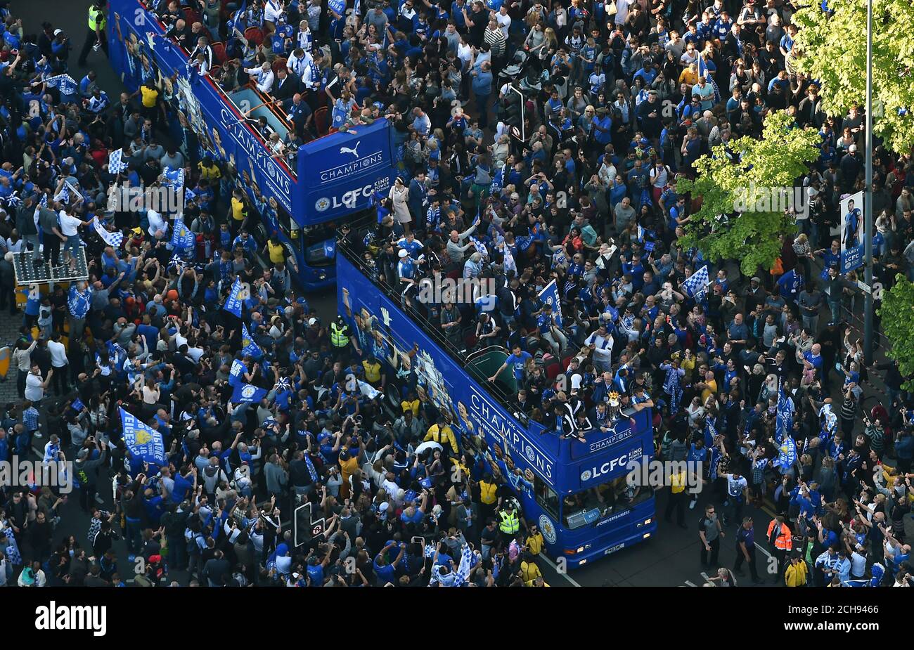 Fans line the streets during the open top bus parade through Leicester ...