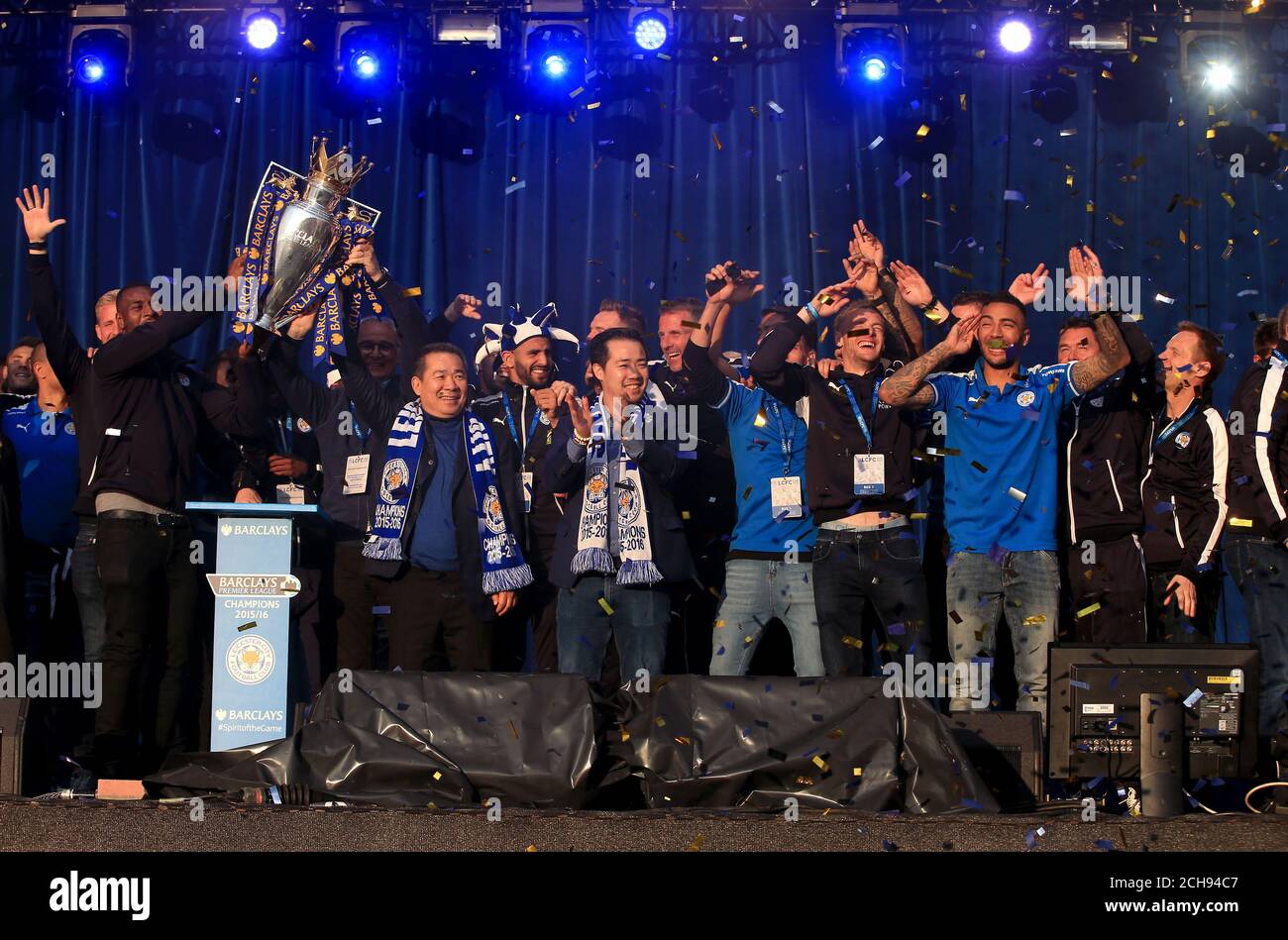 Leicester City manager Claudio Ranieri (trophy right background) and ...