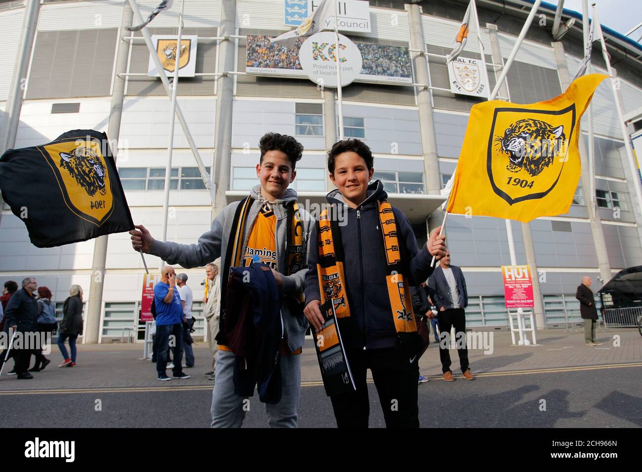 Young fans waving flags outside stadium hi-res stock photography and ...