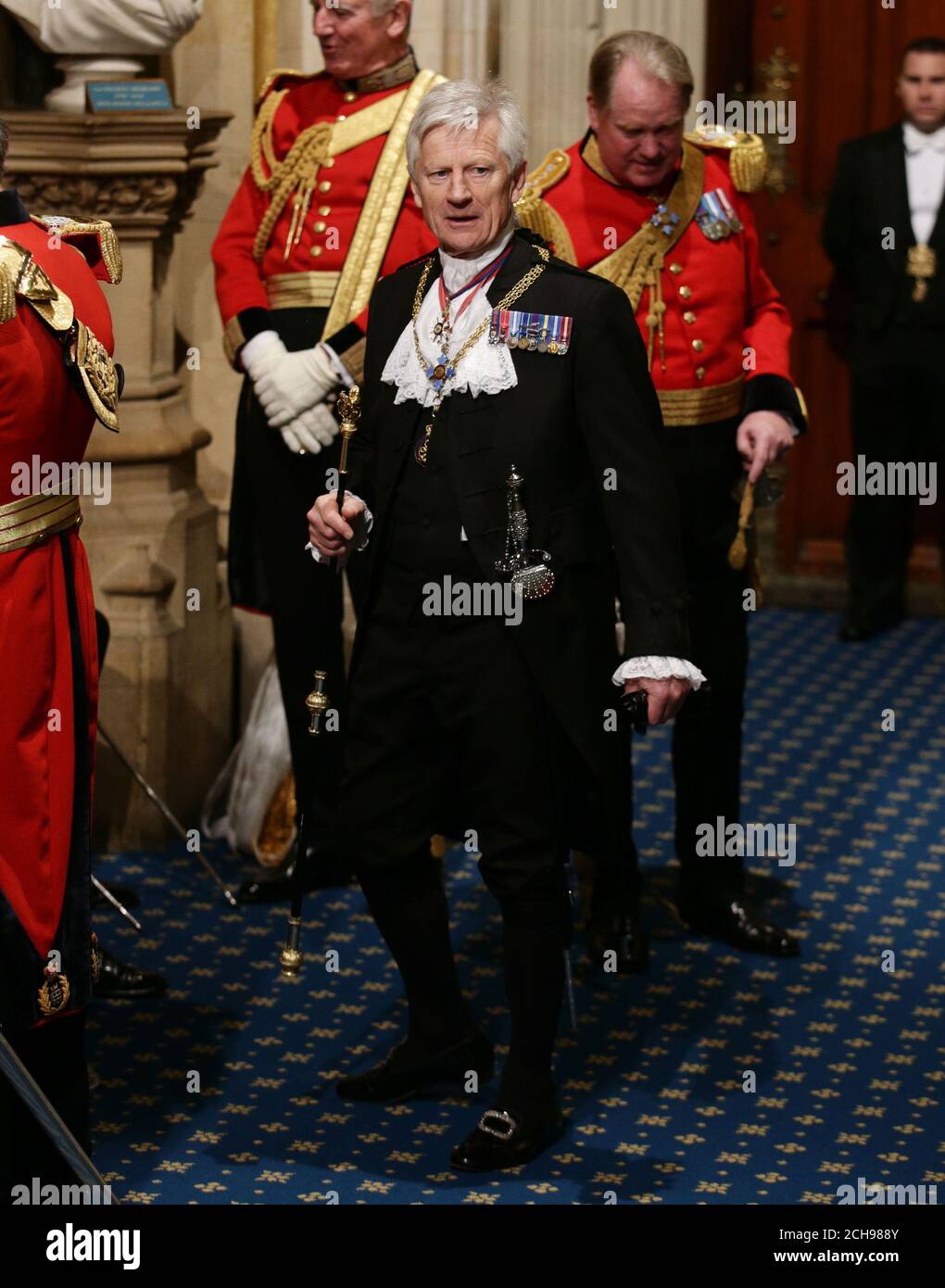 The Gentleman Usher of the Black Rod walks through Norman Porch ahead ...