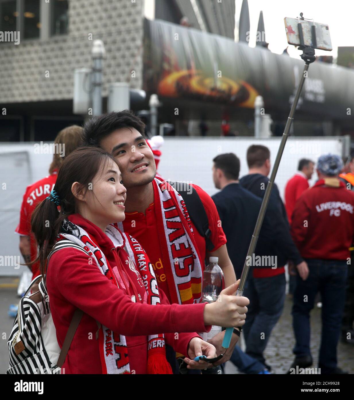 Liverpool fans take a selfie on their way to St. Jakob-Park before the ...