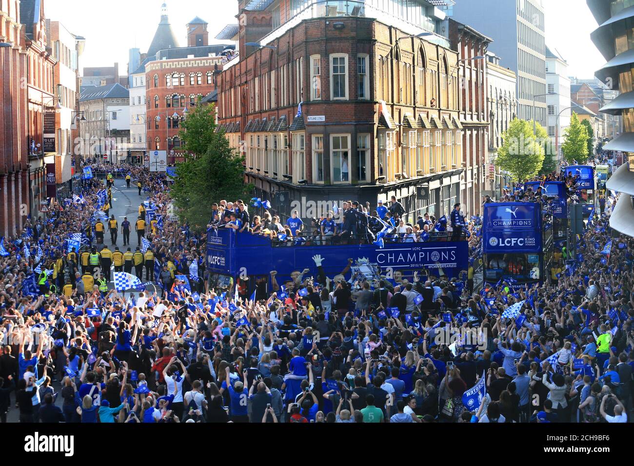 Leicester City's team celebrate on the bus during the open top bus ...