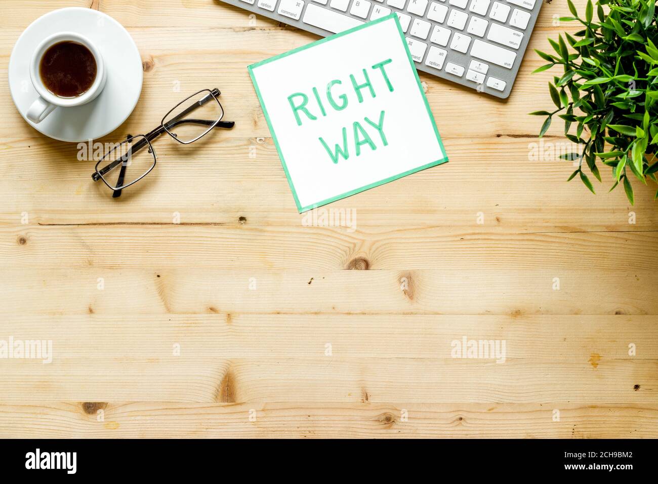 Right way icon on wooden office desk top view copy space Stock Photo ...