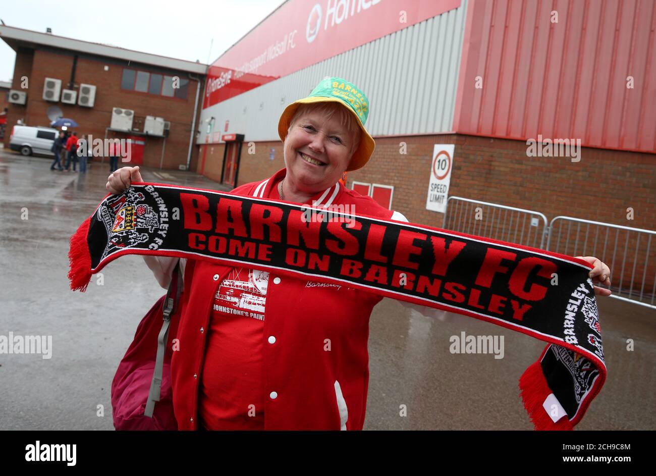 Barnsley fan Tina Giles holds a scarf outside Banks's Stadium before ...