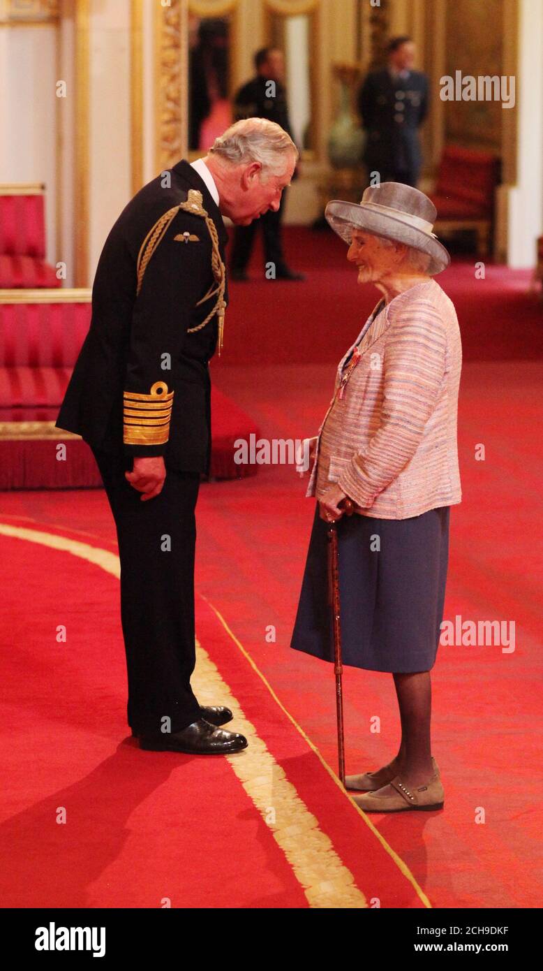 Made cbe by prince wales investiture ceremony buckingham palace hi-res ...