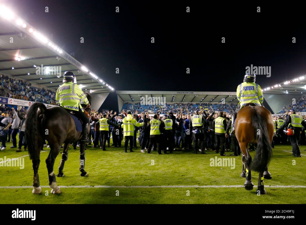Mounted police millwall fans invade pitch to celebrate reaching final ...