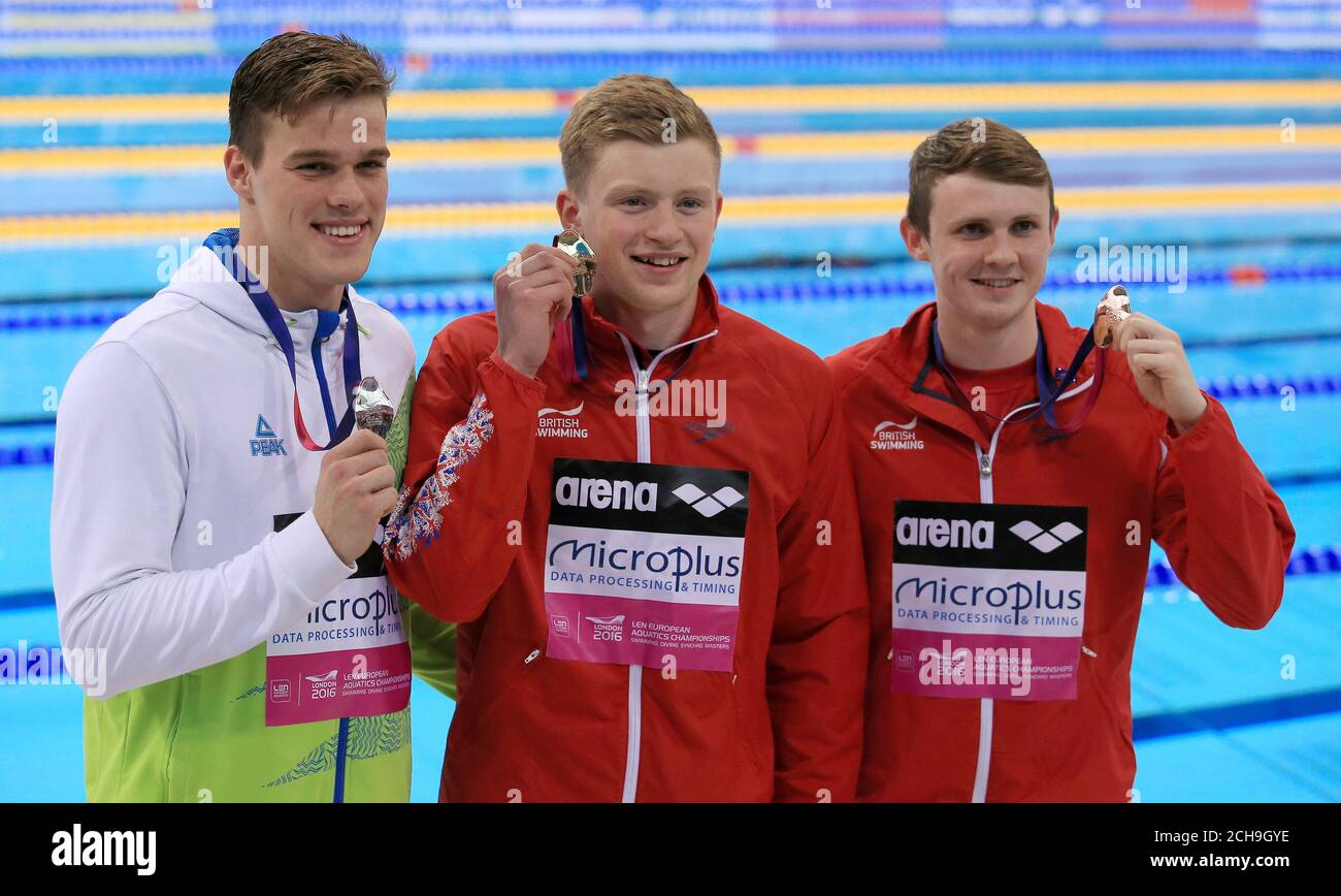 Great Britain's gold medalist in the men's 50m breaststroke final Adam ...