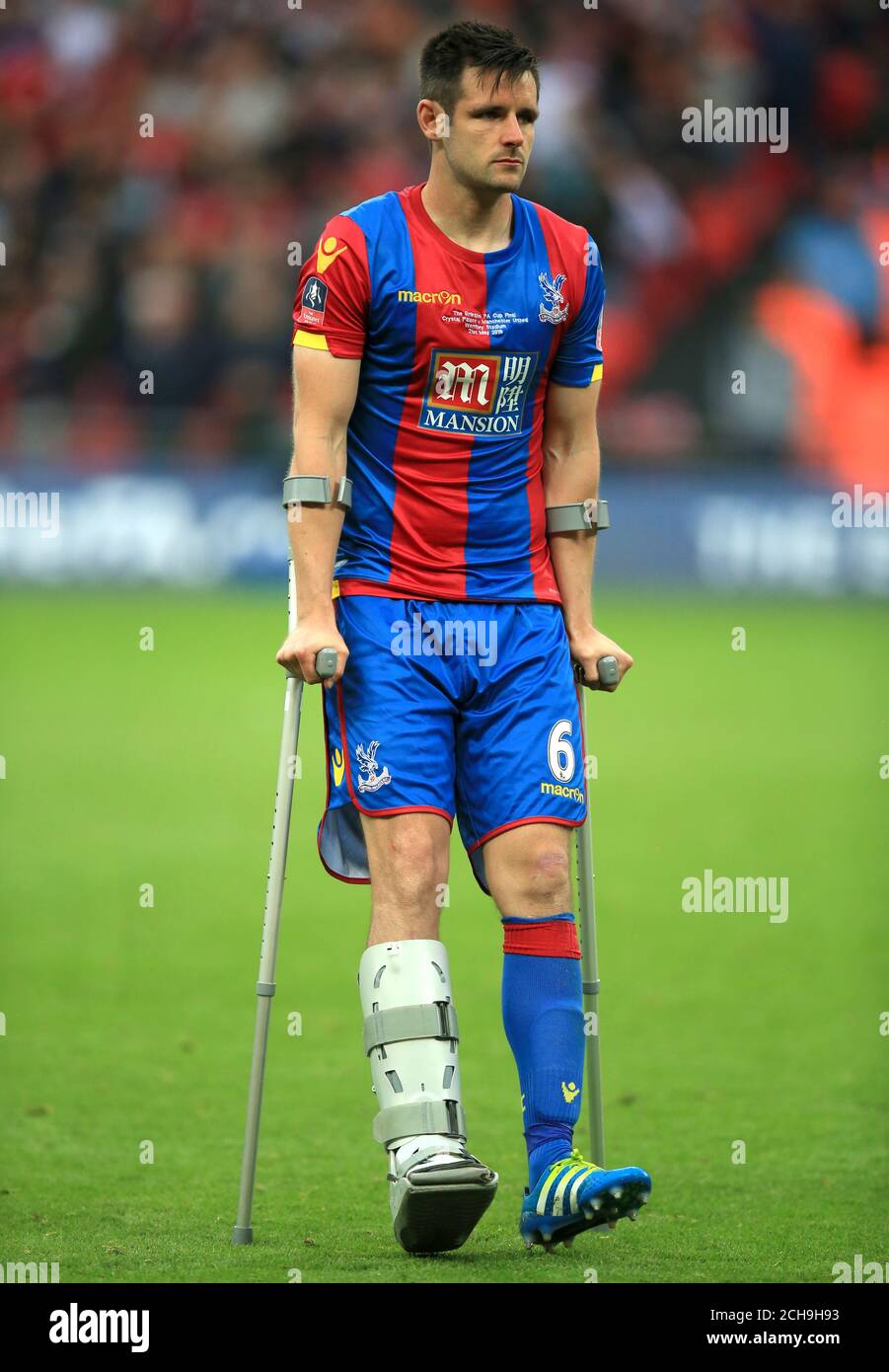 Football with crutches hi-res stock photography and images - Alamy