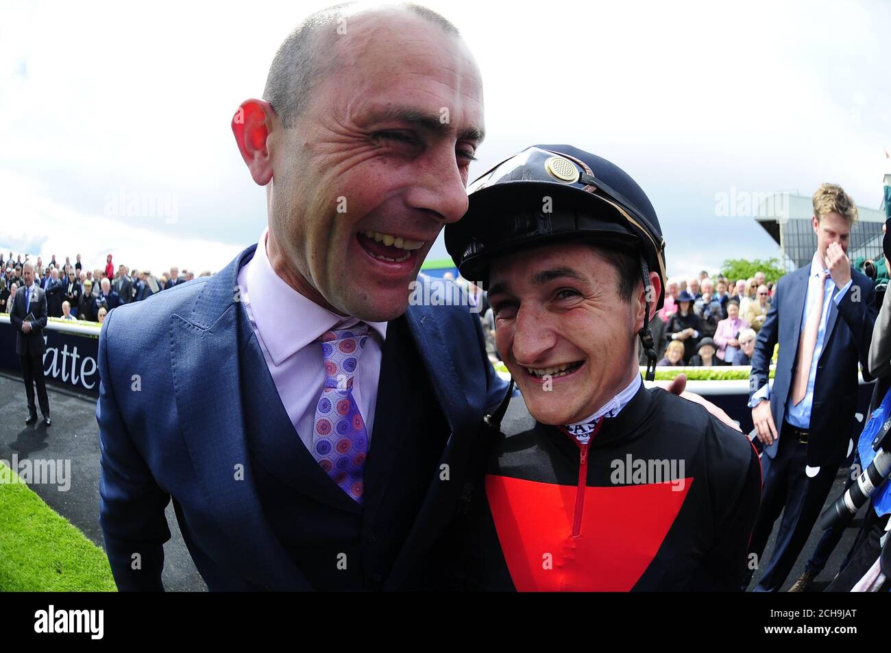 Jockey Shane Foley celebrates with trainer Adrian Keatley after winning ...