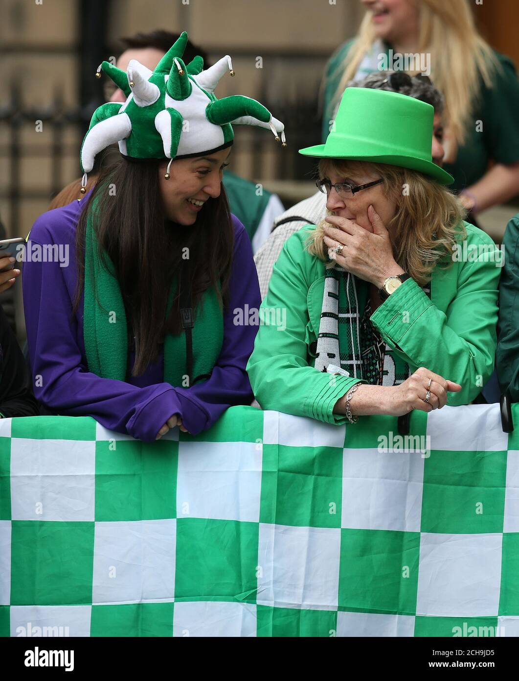 Hibernian fans watch the Scottish Cup winners travel down the Royal ...