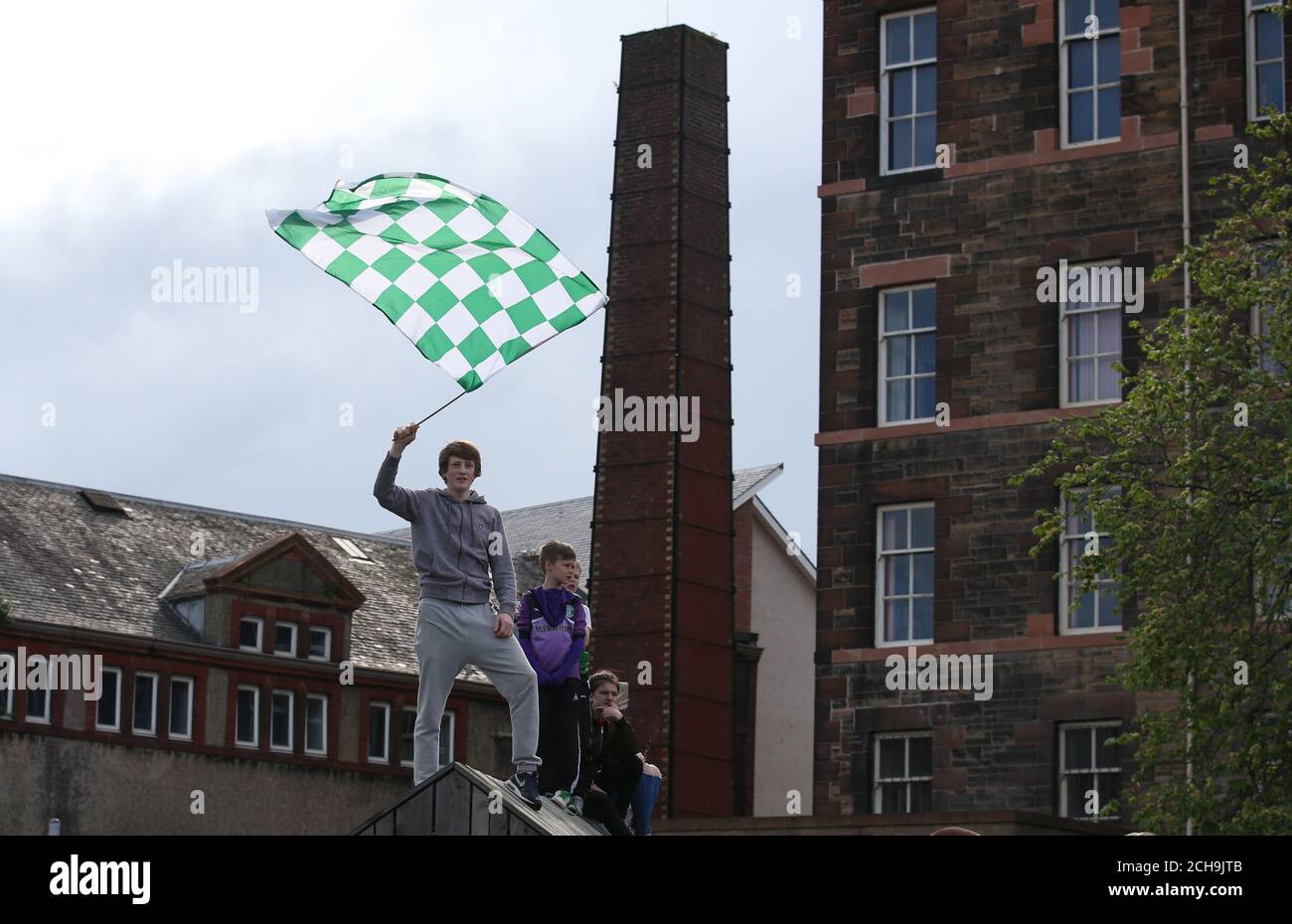 Hibernian supporters line the route at the Leith Links as the team ...