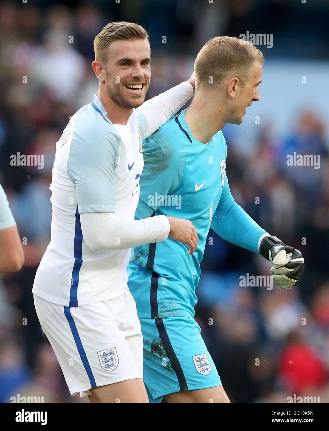 England's Jordan Henderson (left) and goalkeeper Joe Hart celebrate ...