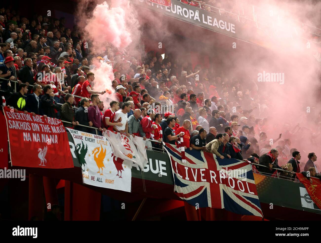 Liverpool fans in the stands Stock Photo - Alamy