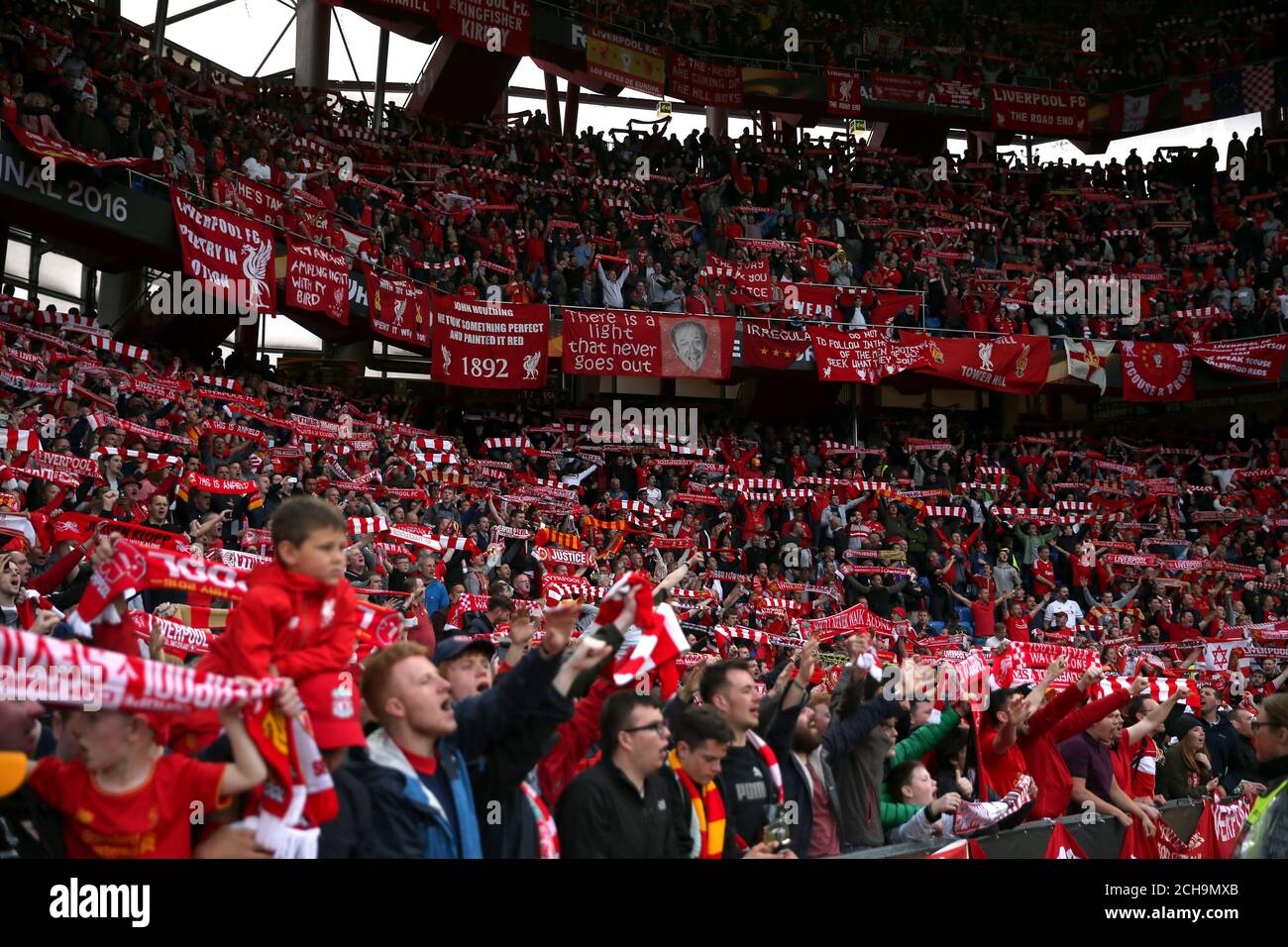Liverpool fans in the stands Stock Photo - Alamy
