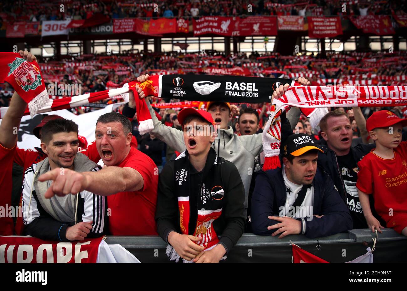 Liverpool fans in the stands Stock Photo - Alamy
