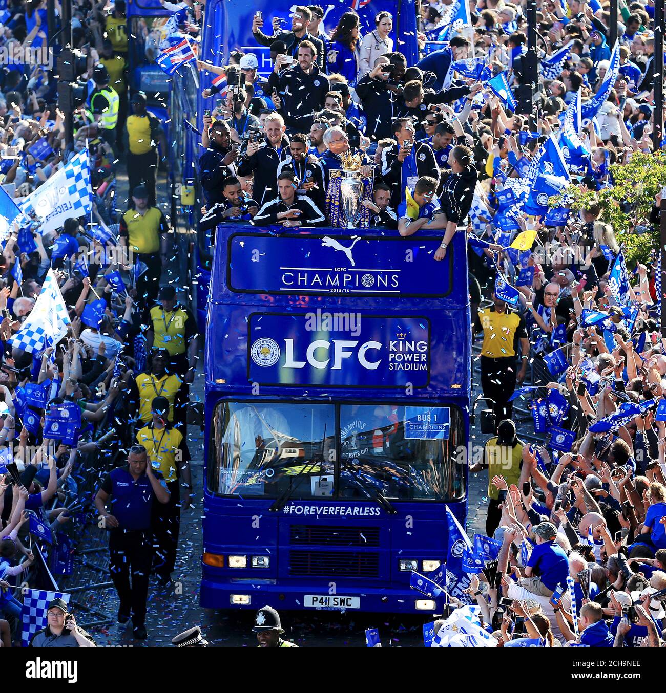 Leicester City players celebrate with the trophy during the open top ... Leicester City players celebrate with the trophy during the open top ...