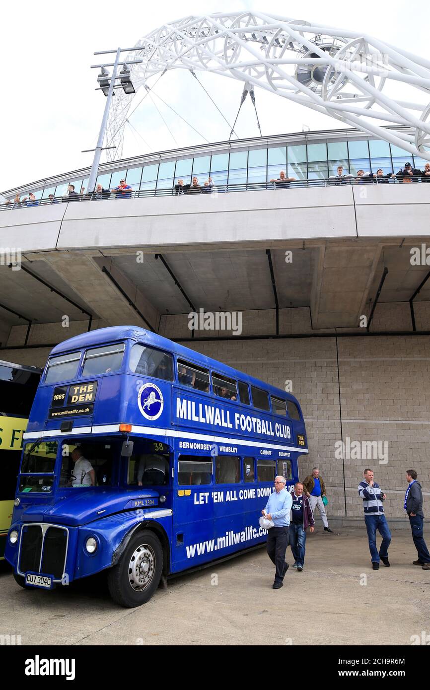 Themed london bus underneath wembley arch seen hi-res stock photography ...