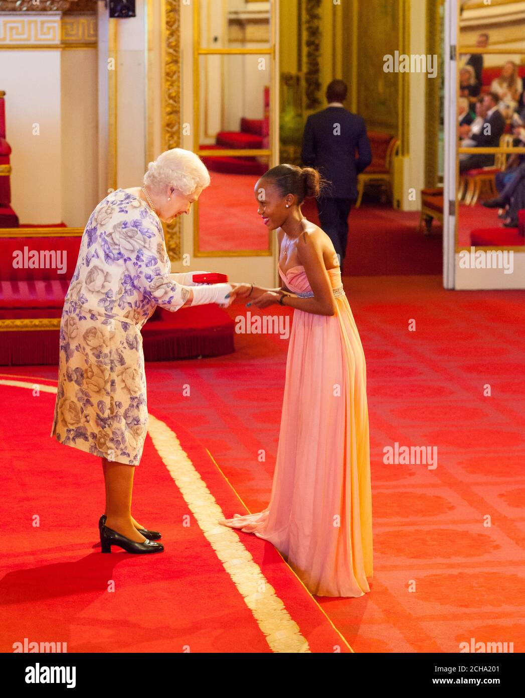 Ms. Lethabo Ashleigh Letube from South Africa receives a medal from ...