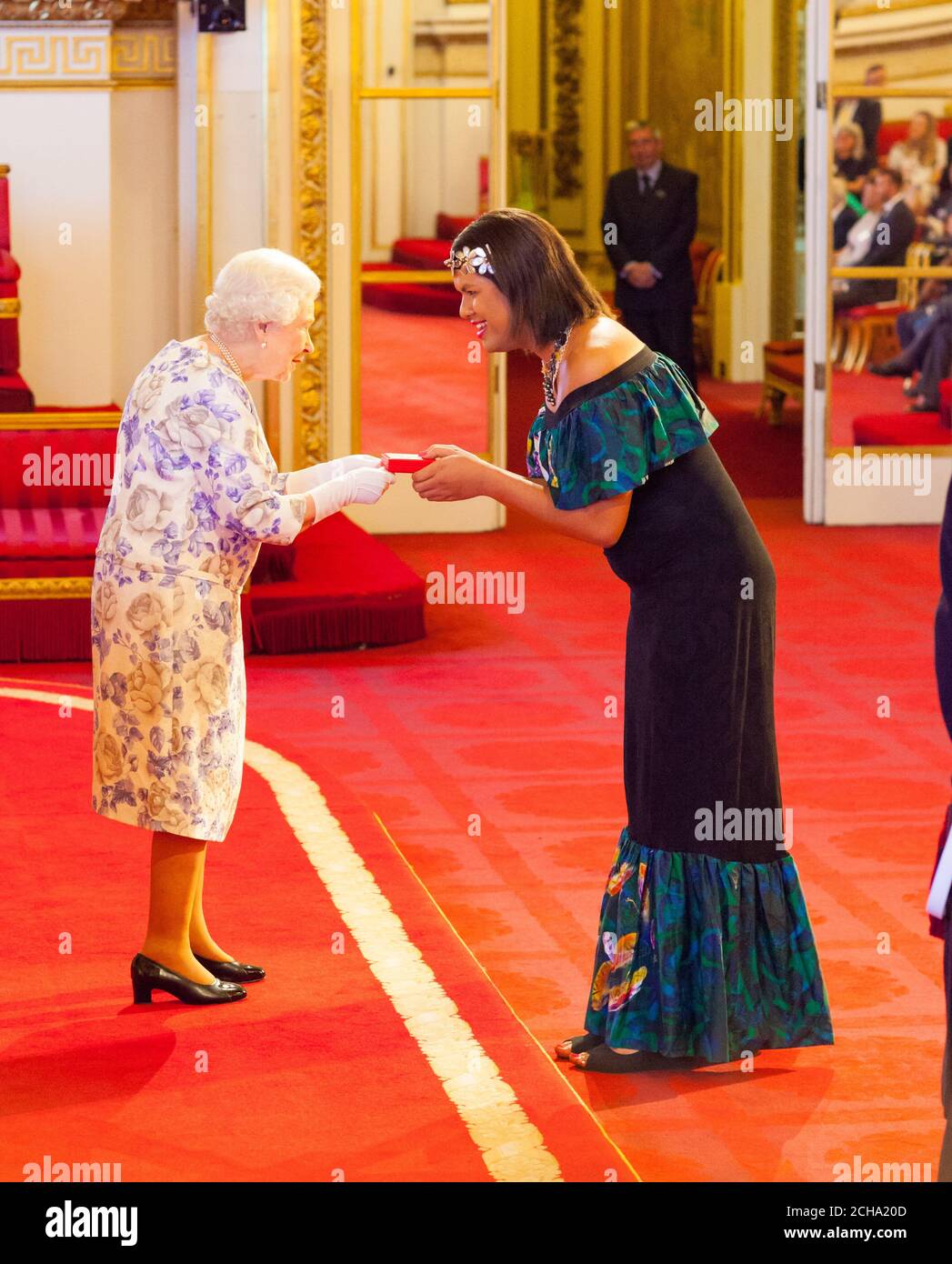 Medal from queen elizabeth ii at buckingham palace hi-res stock ...