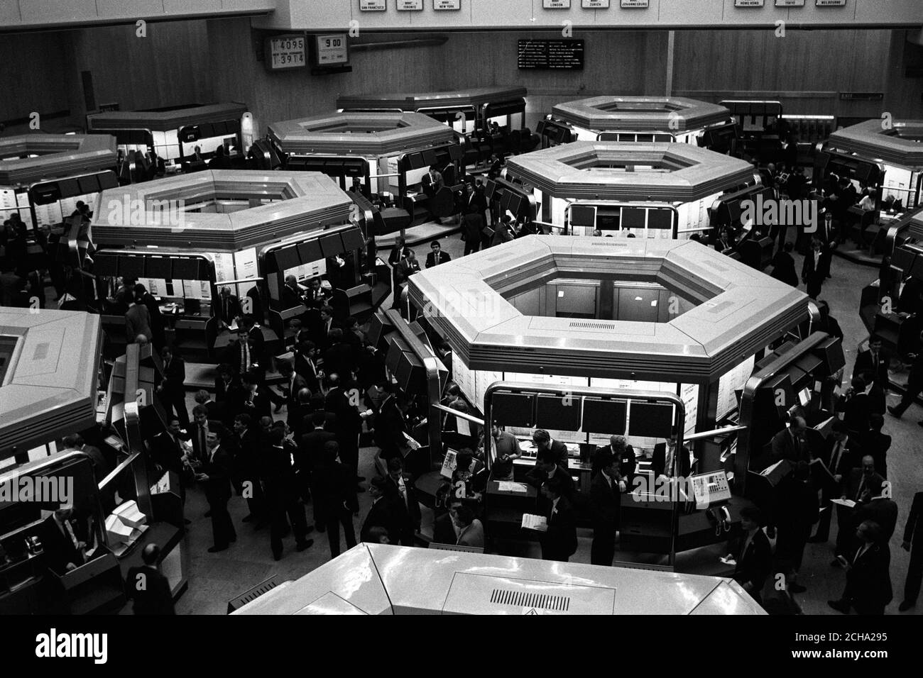 Dealing on the new high-technology computer systems on the floor of the ...