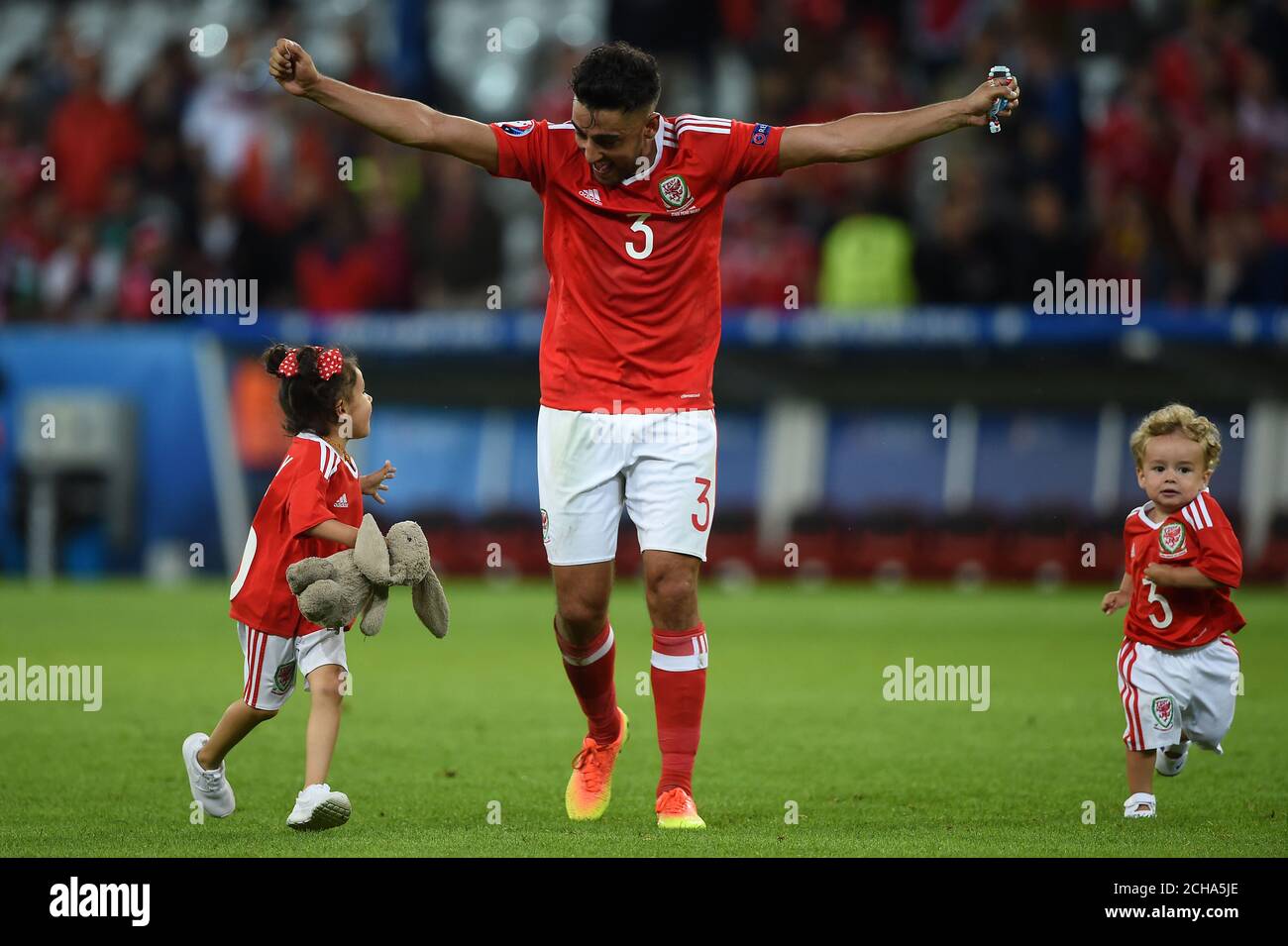 Wales' Neil Taylor celebrates with family after the UEFA Euro 2016 ...