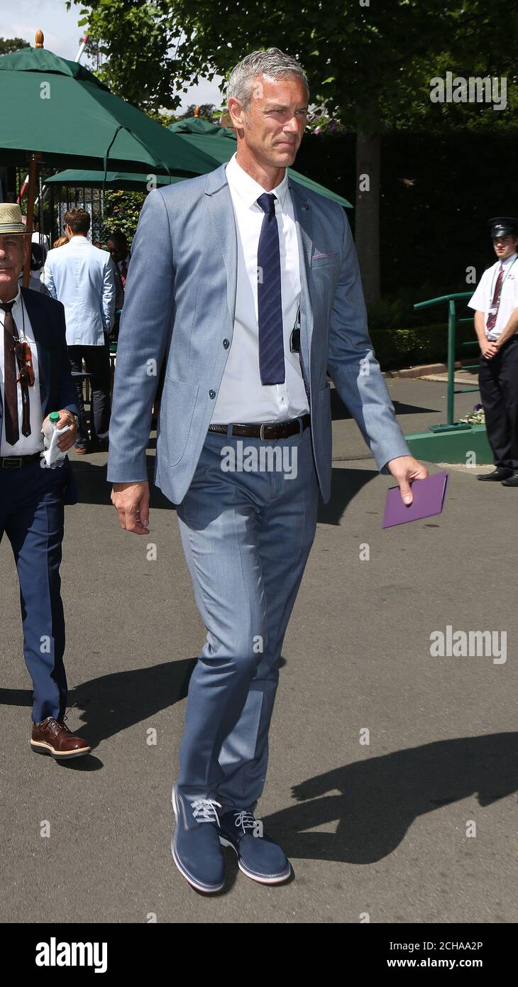 Mark Foster arrives on day nine of the Wimbledon Championships at the ...