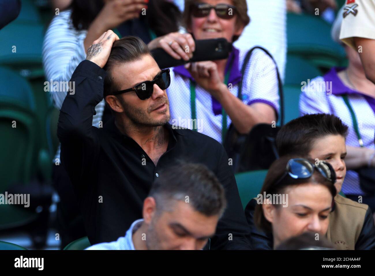David Beckham in the stands on centre court on day nine of the ...