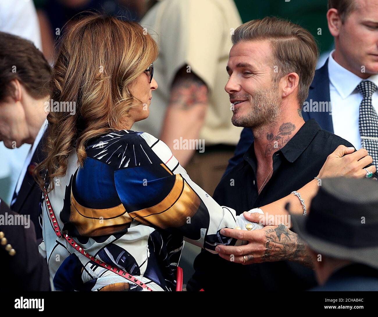 Mirka Federer speaks with David Beckham on day nine of the Wimbledon ...