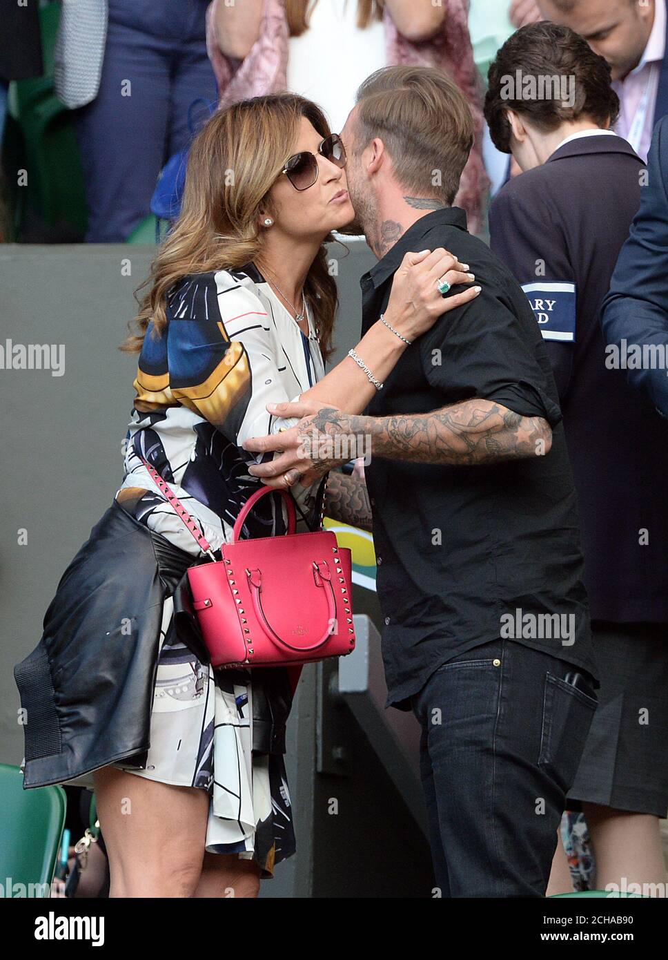Mirka Federer speaks with David Beckham on day nine of the Wimbledon ...