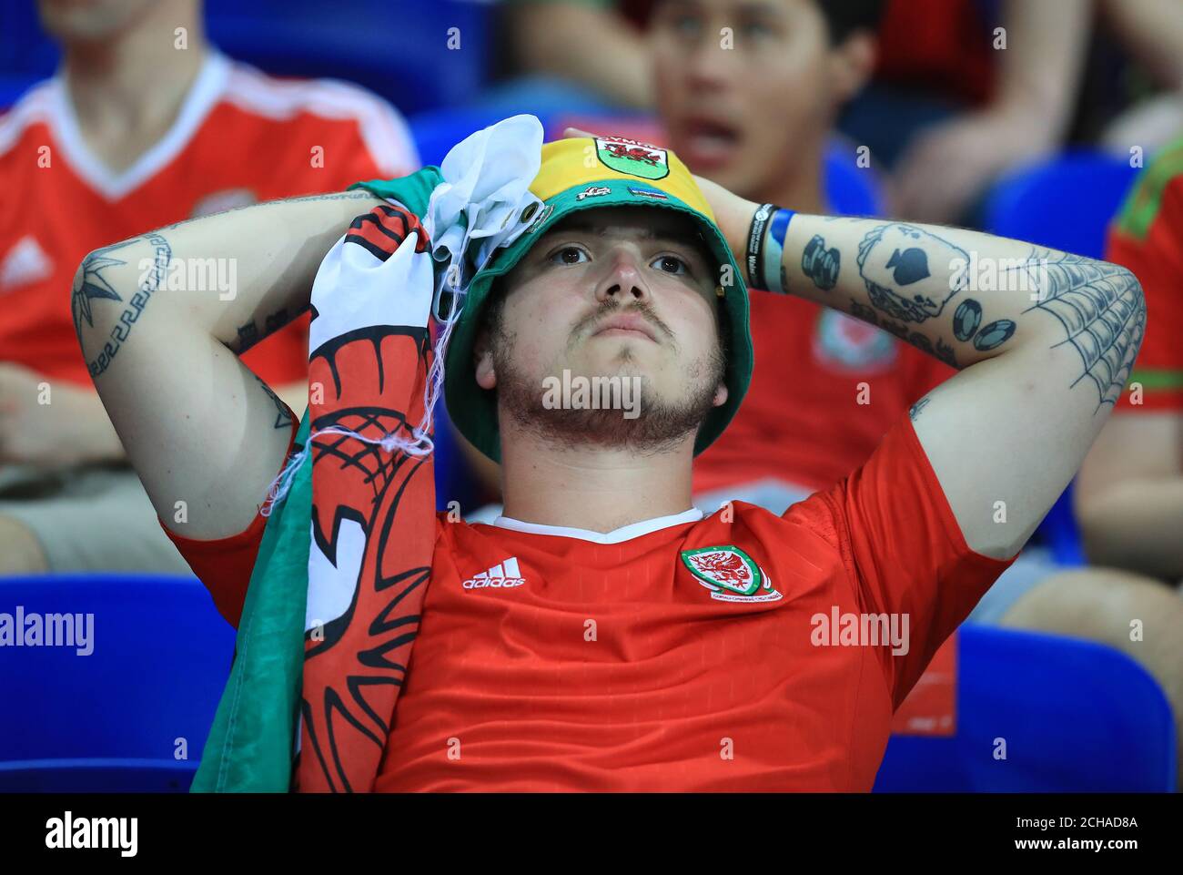 A Wales fan looks dejected in the stands following the UEFA Euro 2016 ...
